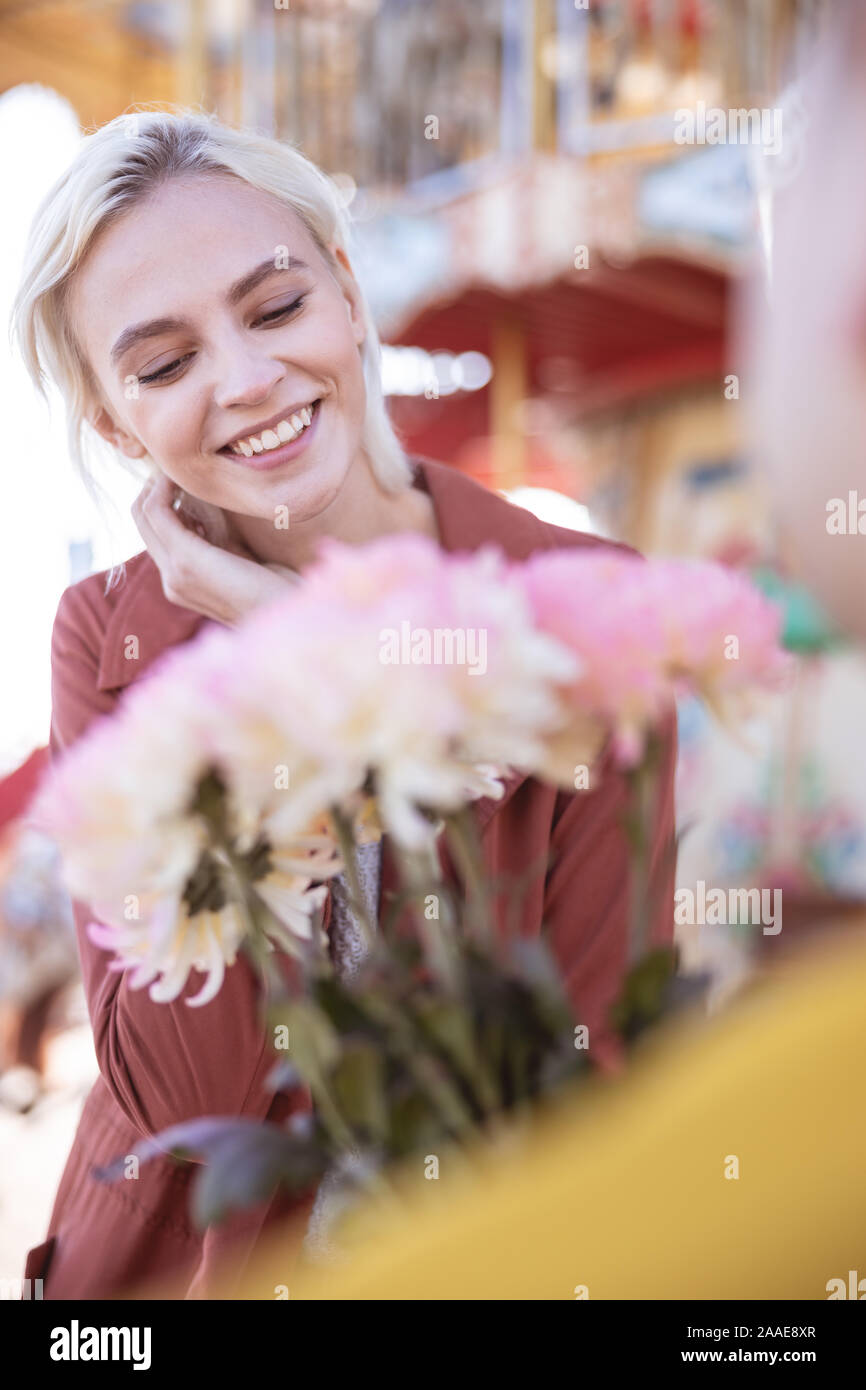 Pretty lady receiving flowers on her birthday Stock Photo - Alamy