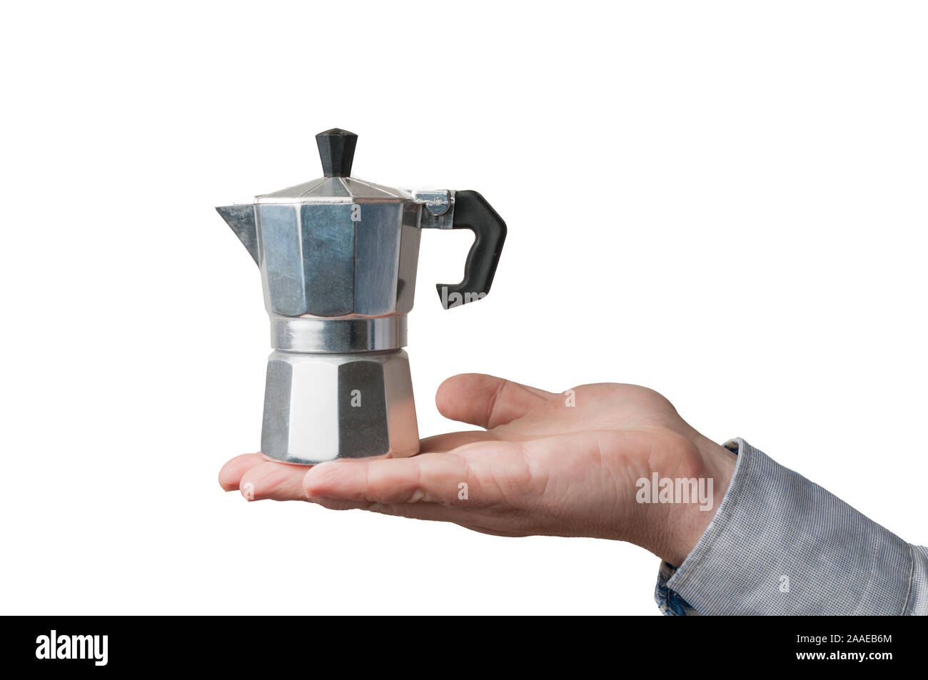 Man hold an italian moka pot coffee maker on his hand, white background ...