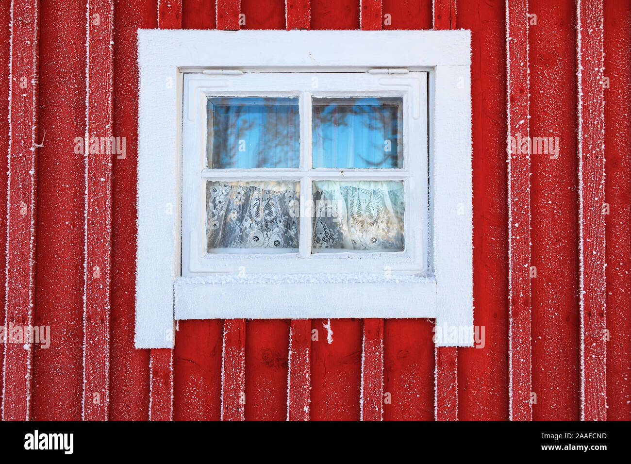 Window on the red cottage with frost Stock Photo - Alamy