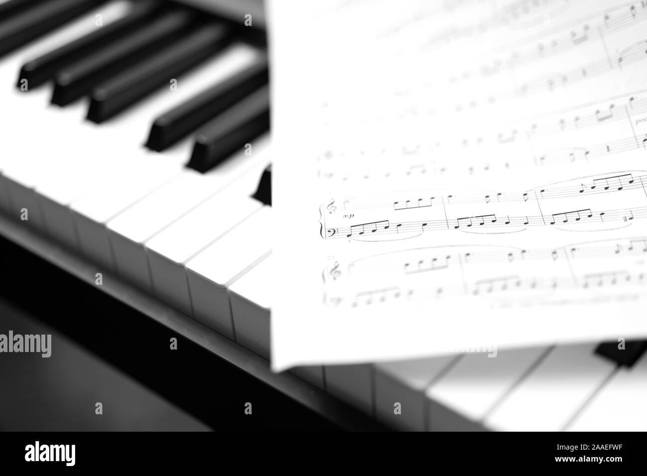 Classic piano and musical sheet . Black and white photo, Musical ...
