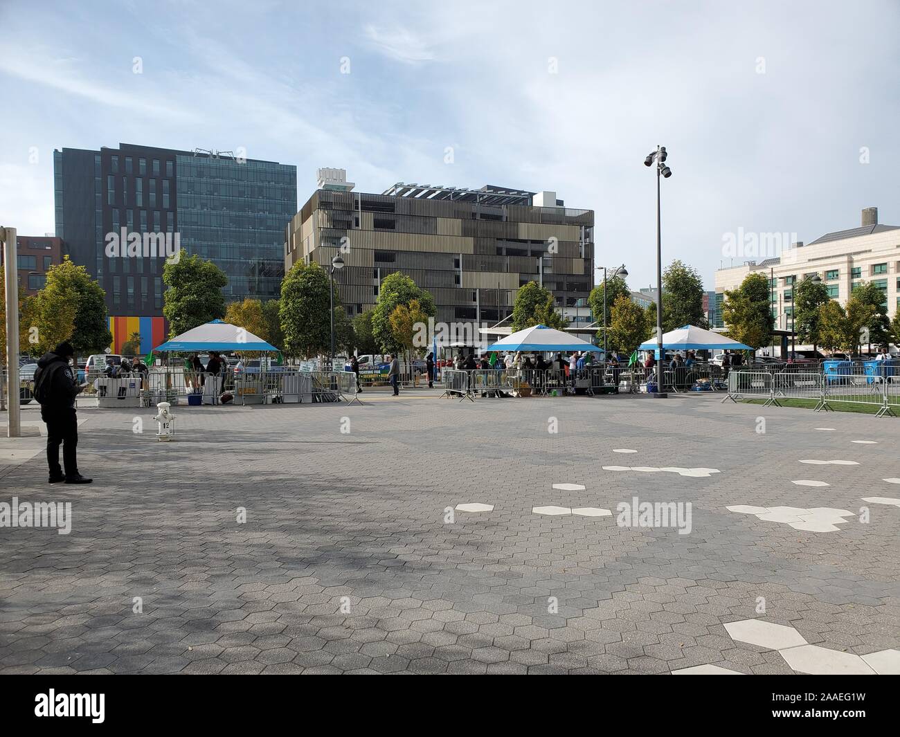 Members of the AFSCME labor union march in a labor protest outside the ...