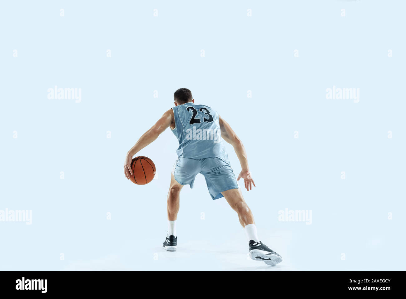 Champion. Young caucasian basketball player of team in action, motion ...