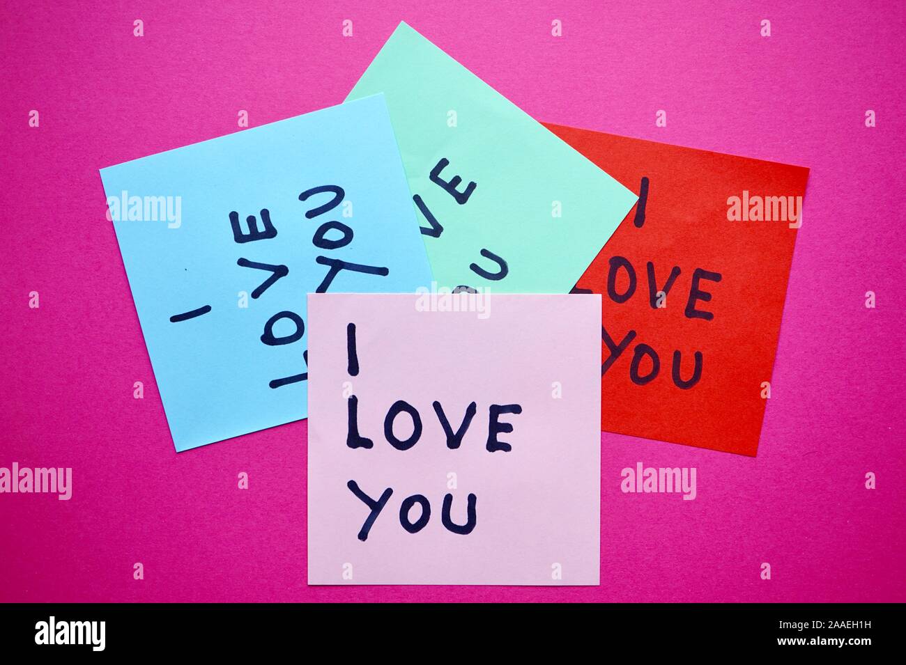 i love you message written on paper, romantic statement Stock Photo - Alamy