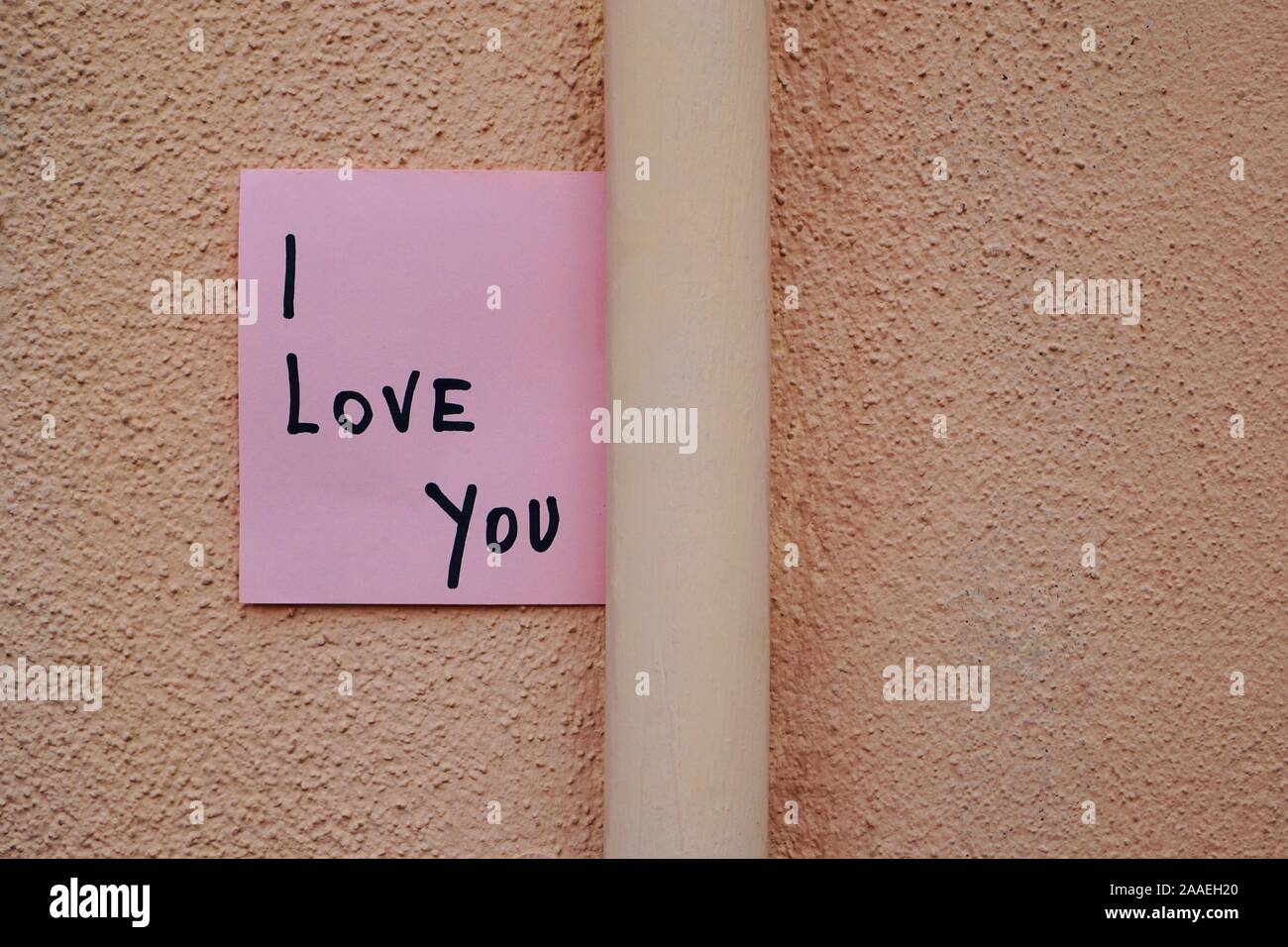 i love you message written on paper, romantic statement Stock Photo - Alamy