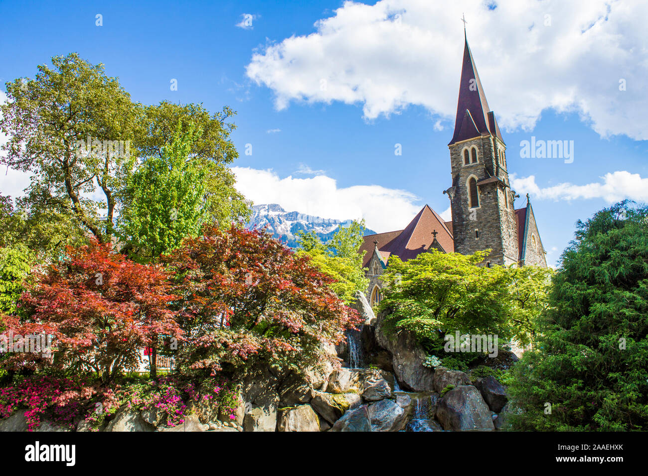 Japanese Garden of Friendship in Interlaken. View of the Church of the ...