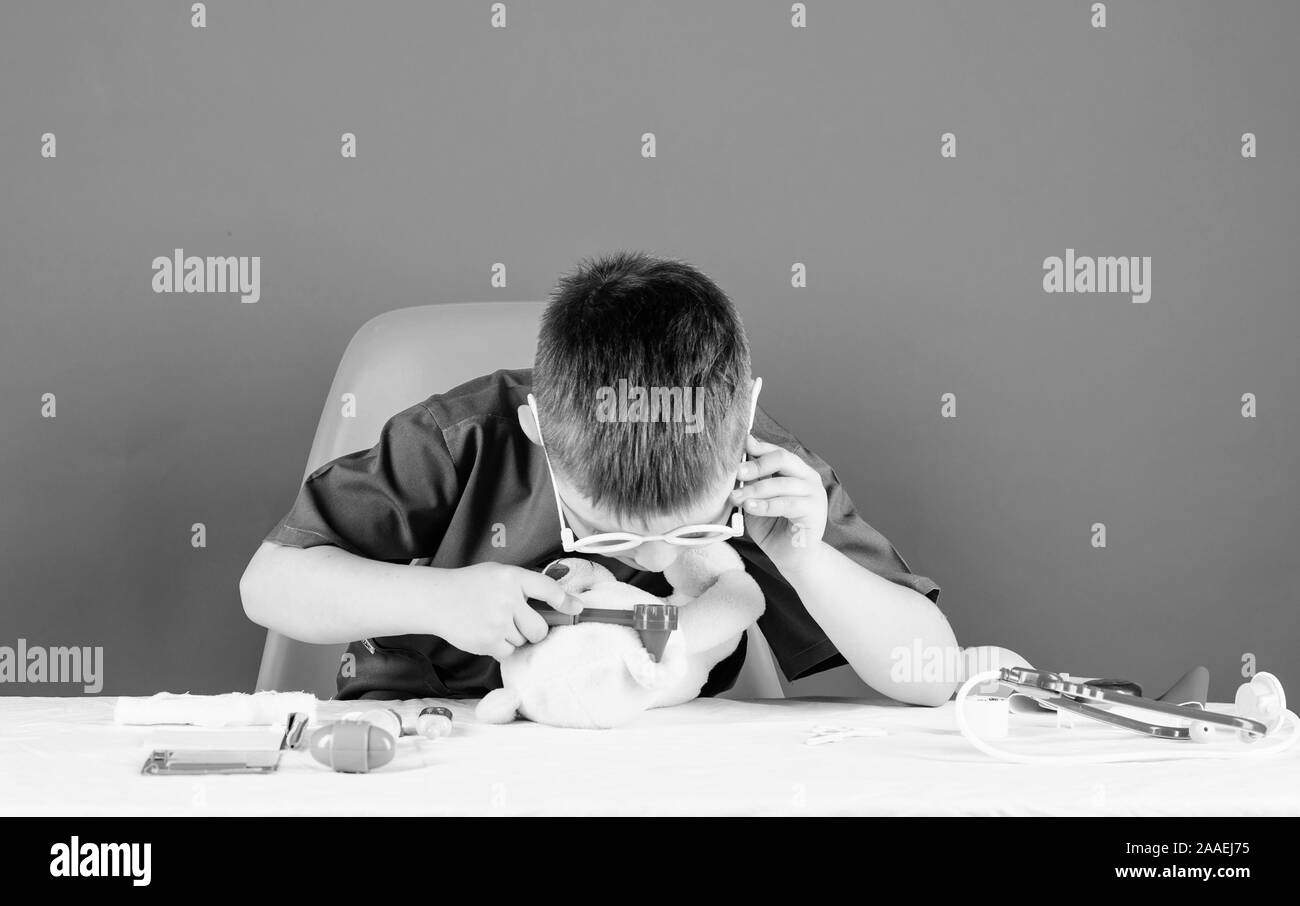 kid doctor with stethoscope. hospital. medicine and health ...