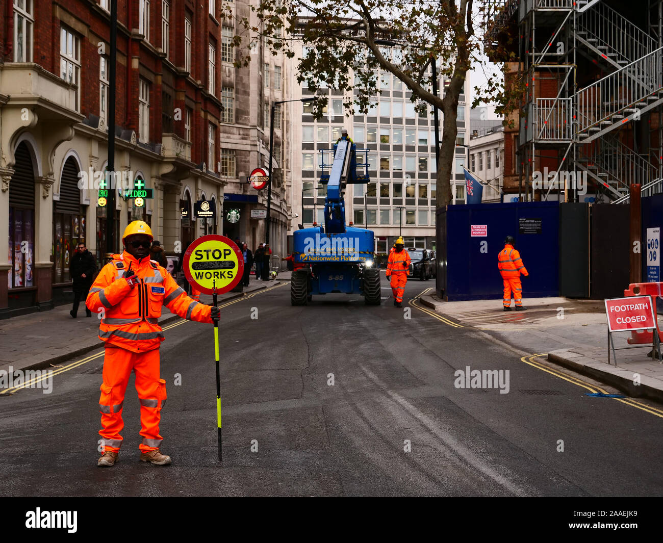 A platform is used by construction workers outside the construction ...