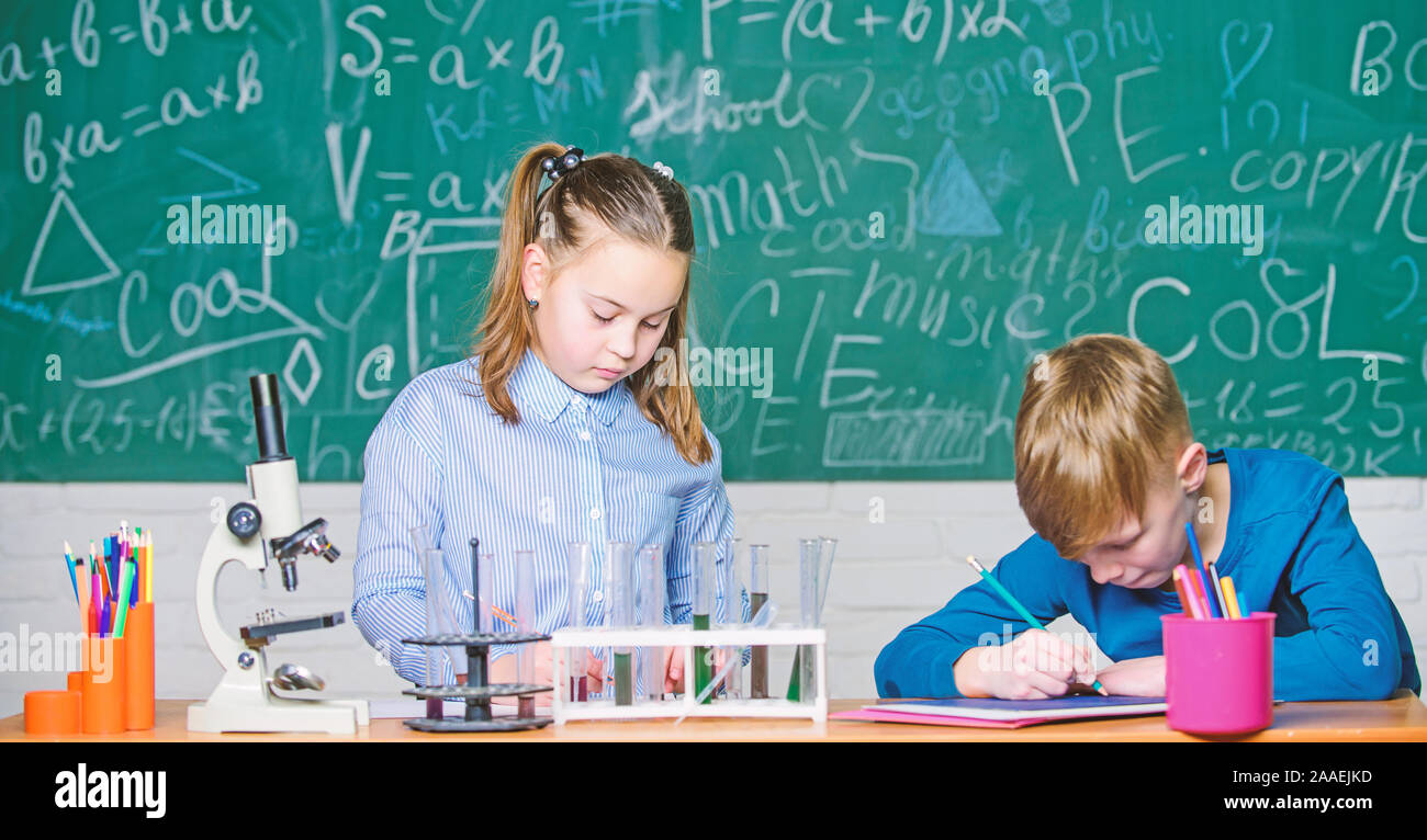 Chemical analysis. Kids busy study chemistry. School chemistry lesson ...