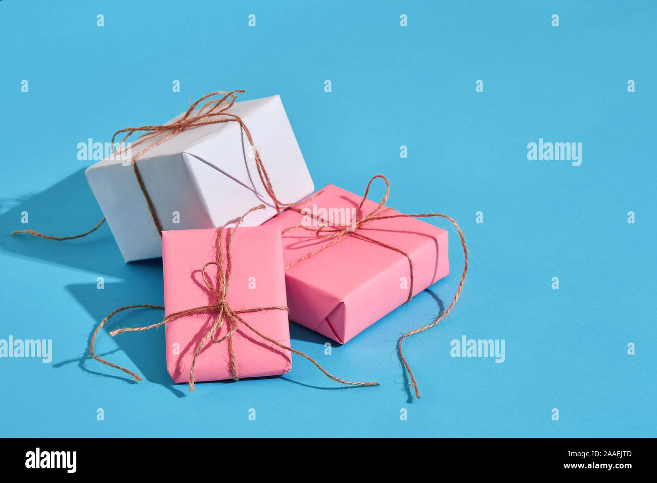 Craft paper wrapped present boxes craft rope bow ribbon with sha Stock ...