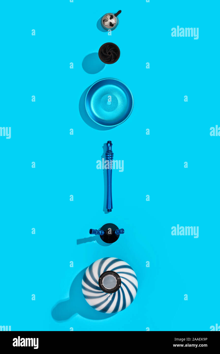 Parts of blue decorated hookah or shisha on light blue backgroun Stock ...