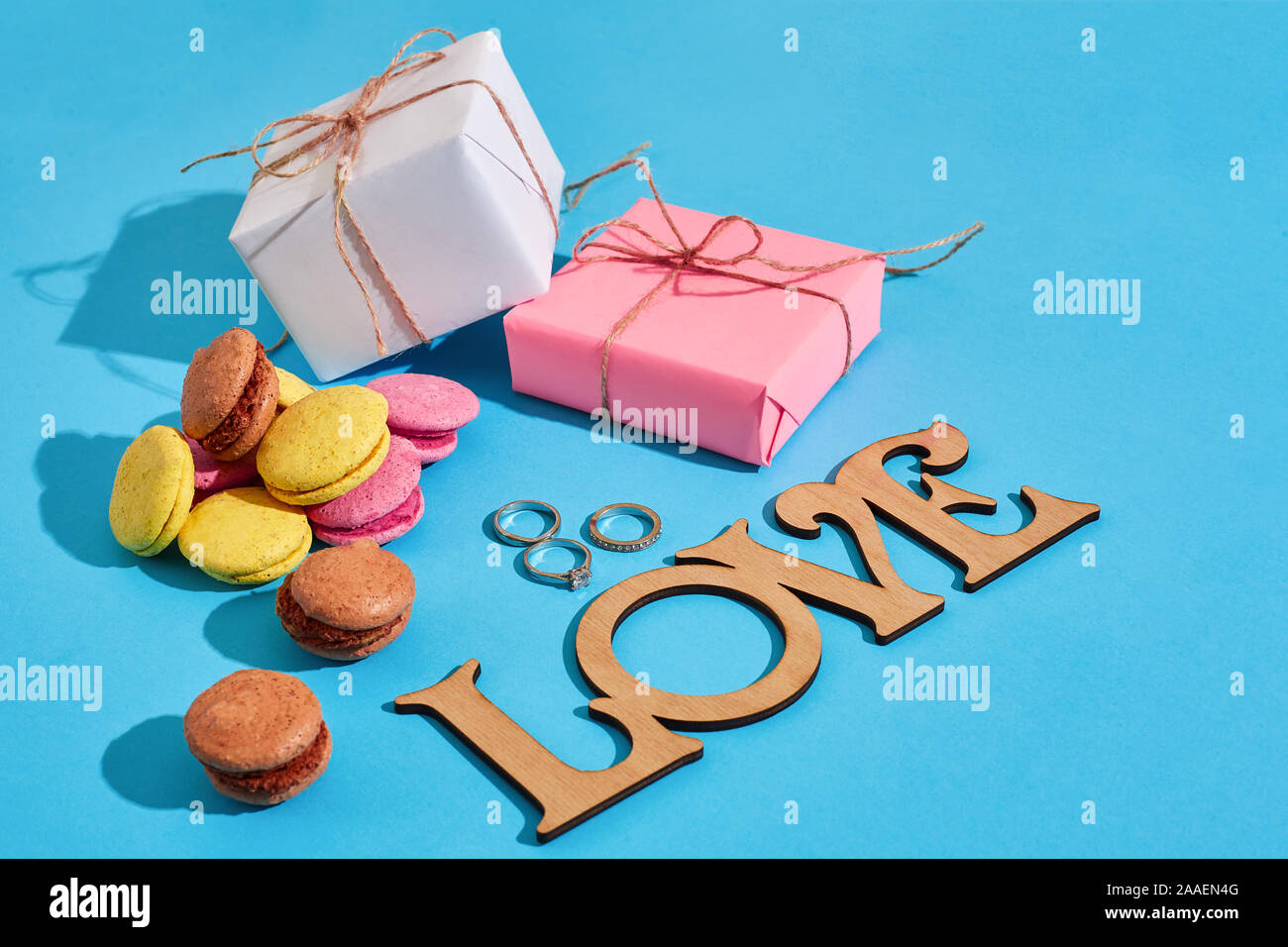 Macaroons and gift boxes on a blue background with the words I l Stock ...