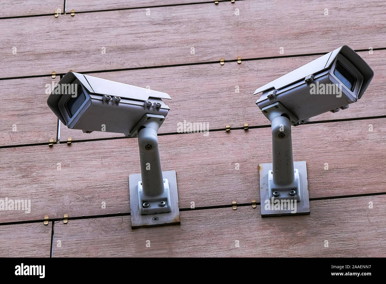 Surveillance cameras building facade closeup. Electronic circuit. The ...