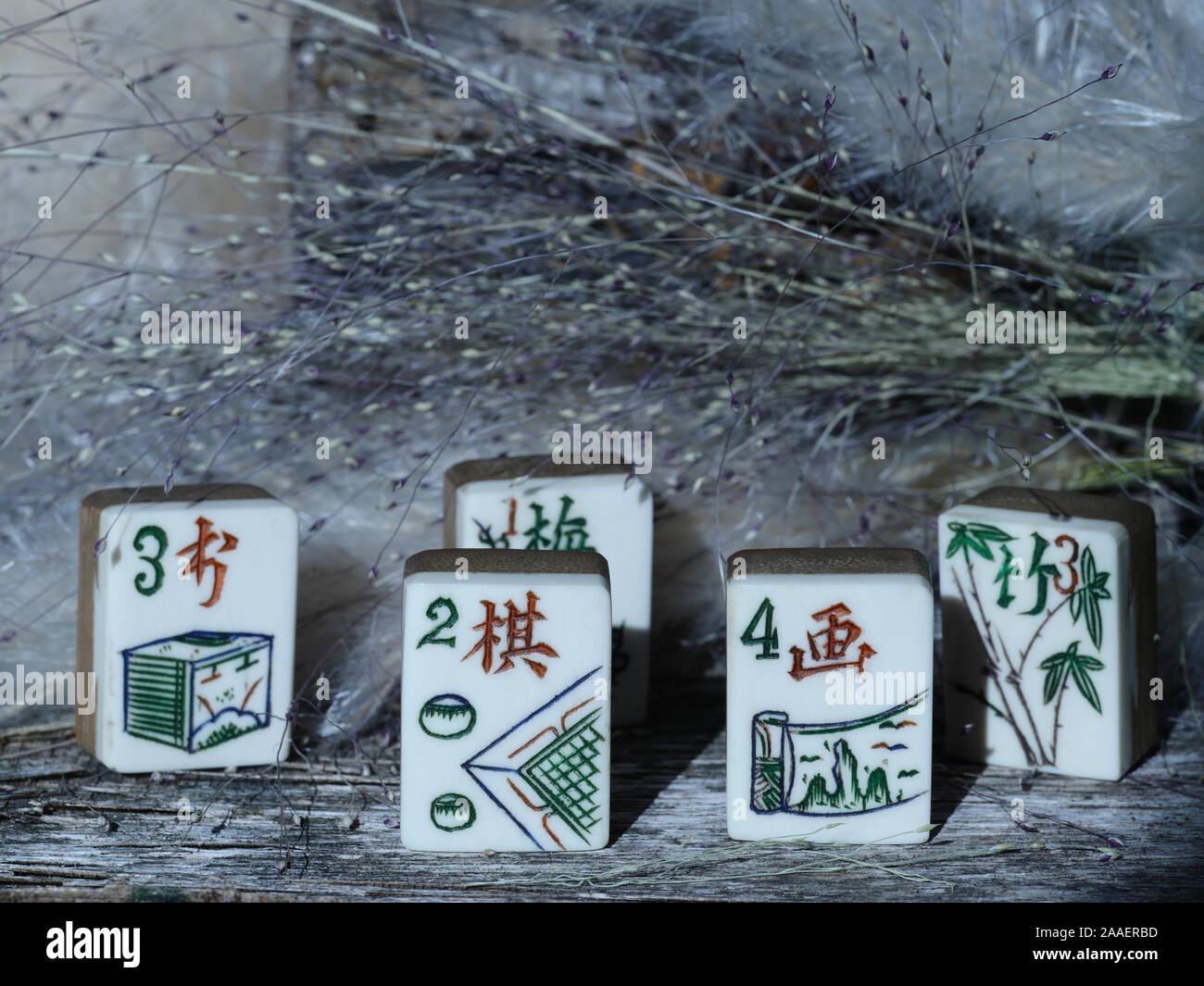 Mahjong tiles of flowers and seasons with grass background Stock Photo ...