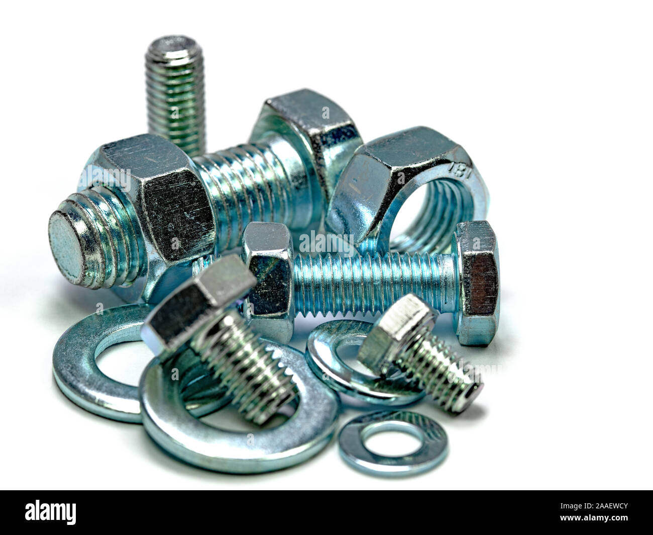 Metal screws in front of white background Stock Photo - Alamy