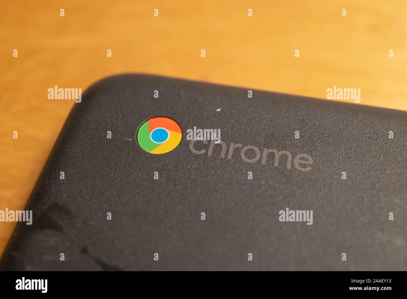 Close-up of logo for Google Chrome on the corner of a compact Google ...