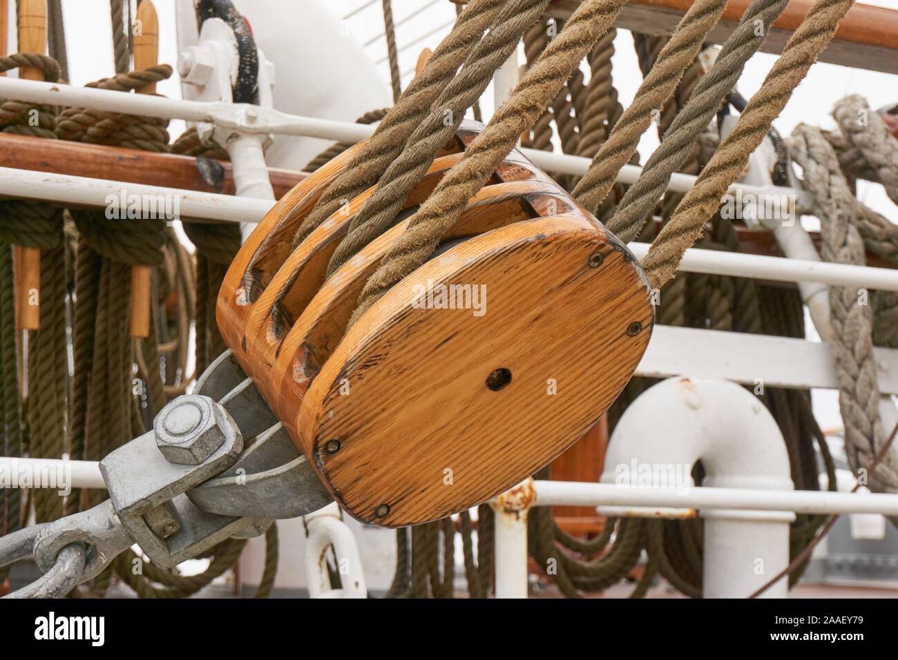 Wooden rope pulley on old sailing ship Stock Photo - Alamy
