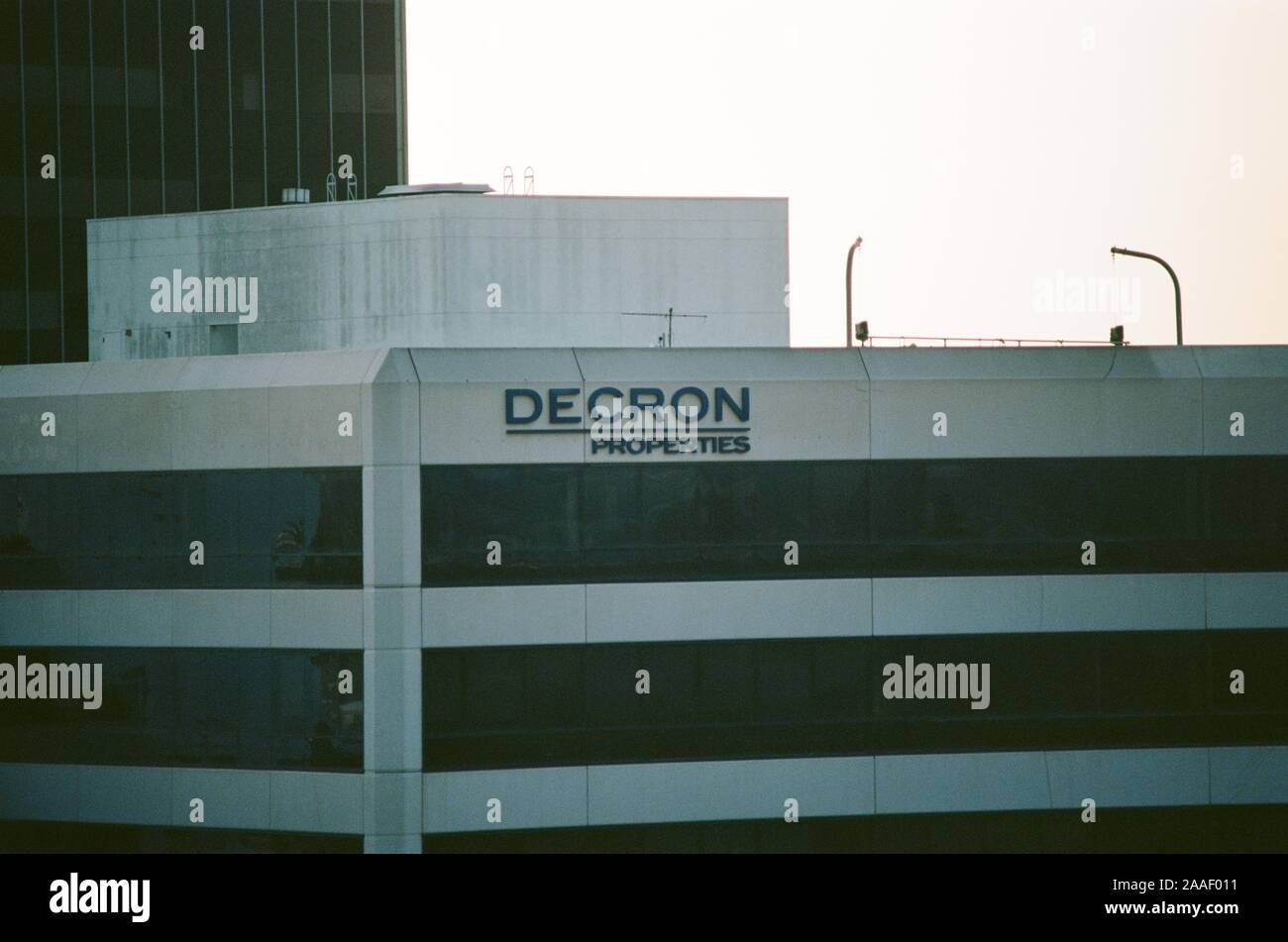 Close-up of sign with logo at Decon Properties building in downtown Los ...