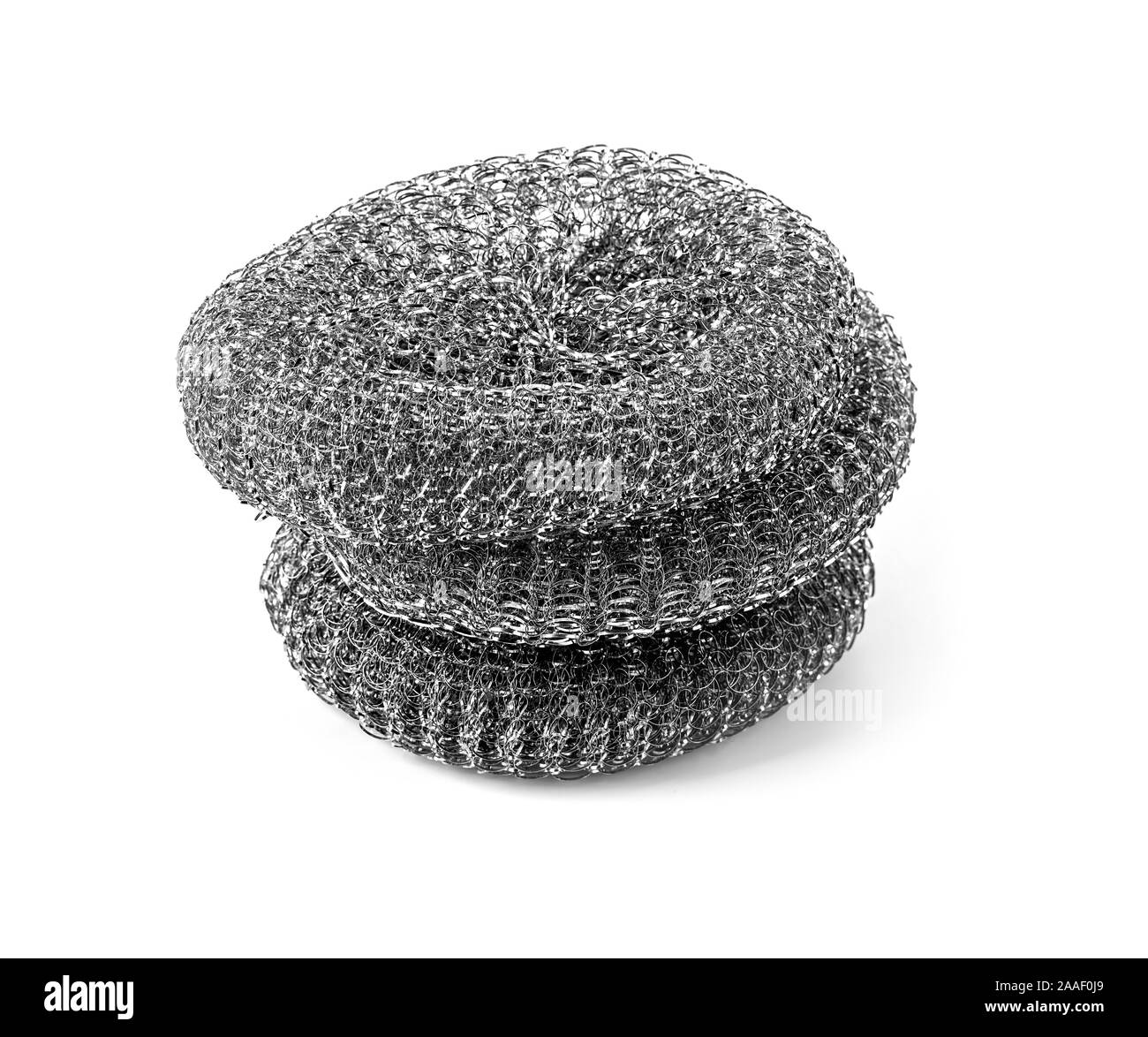 Metal sponge for washing dishes on a white background Stock Photo - Alamy