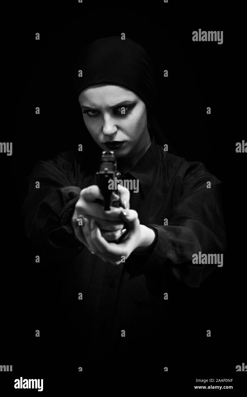Woman aiming pistol Black and White Stock Photos & Images - Alamy