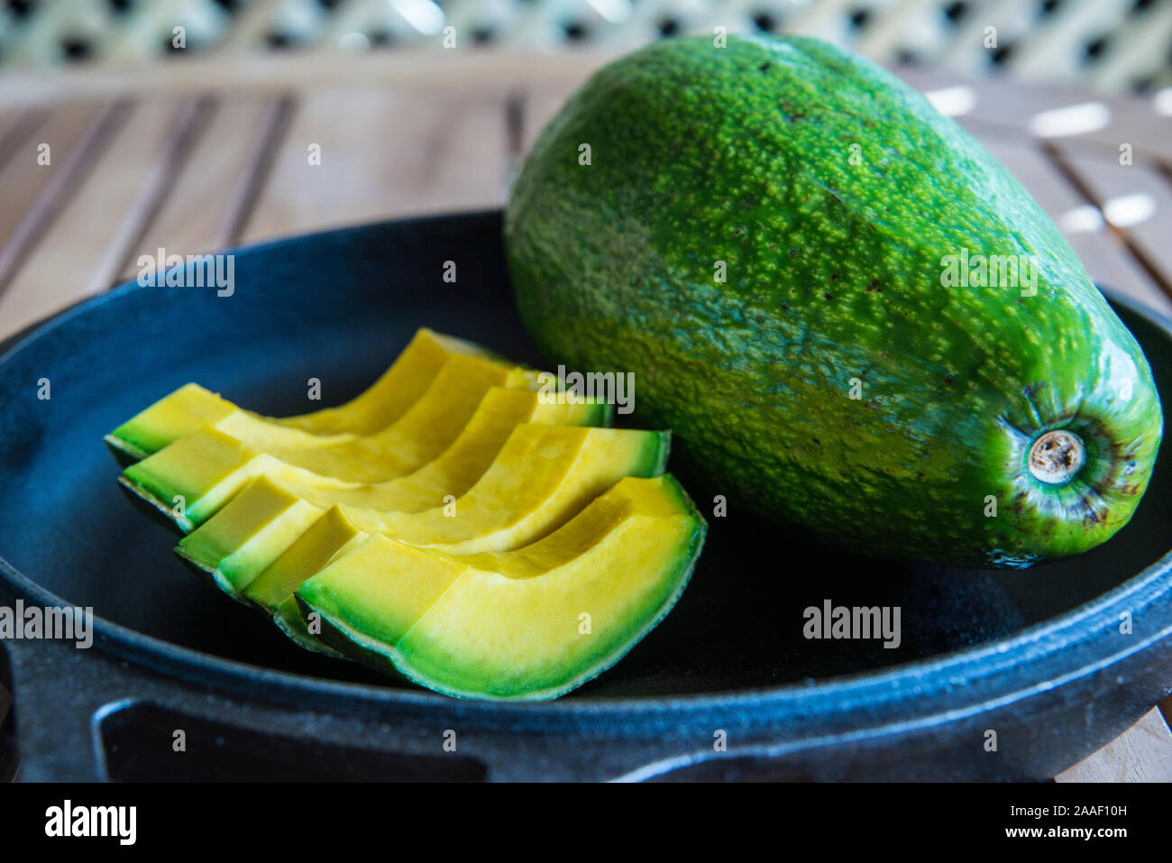 Freshly cut sliced Cuban avocado Stock Photo - Alamy