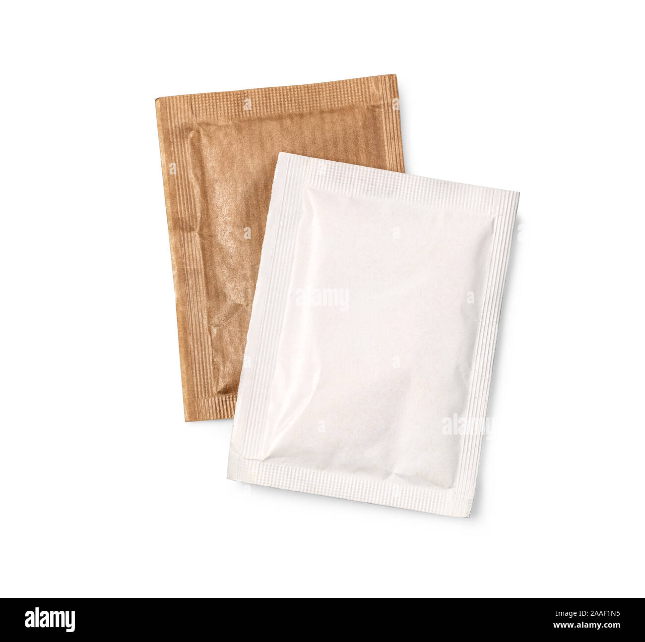 Small sugar packets isolated on white, with clipping path Stock Photo ...