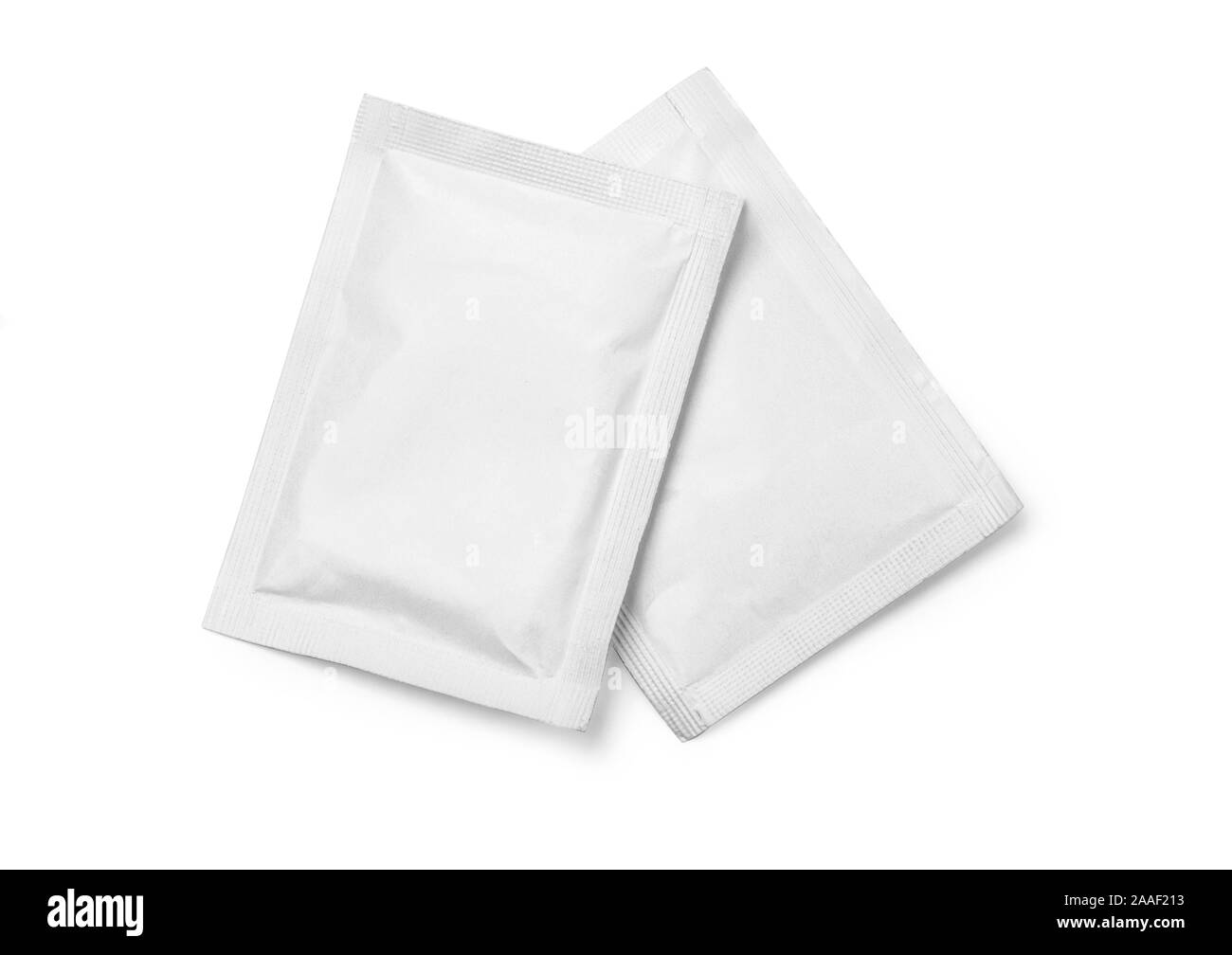 Small sugar packets isolated on white, with clipping path Stock Photo ...