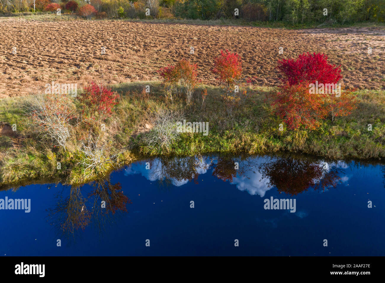 View from above. Latvian autumn nature. Reflection of sky in river ...