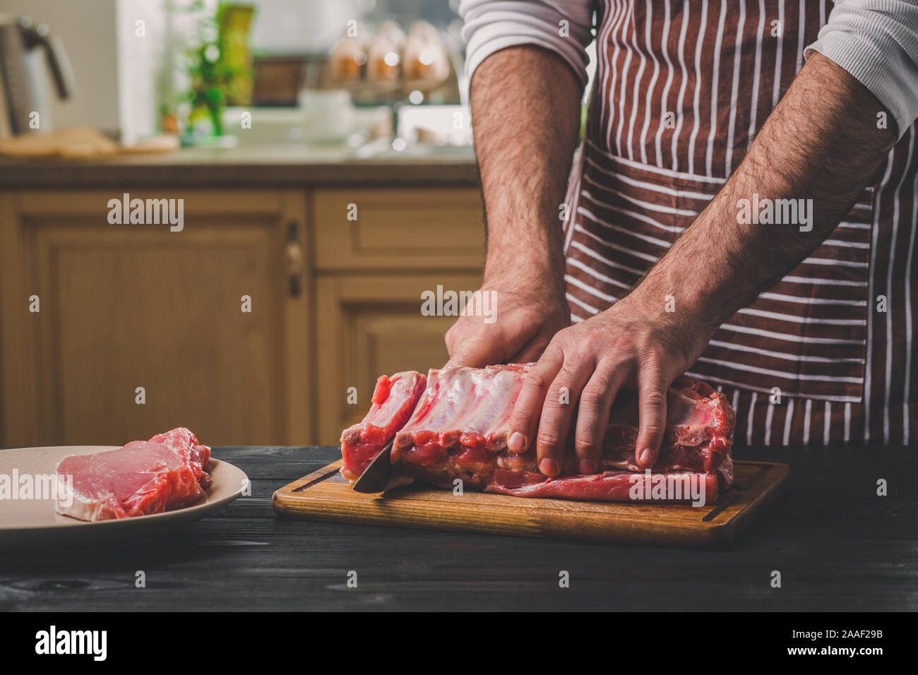 Chef in action preparing steak hi-res stock photography and images - Alamy