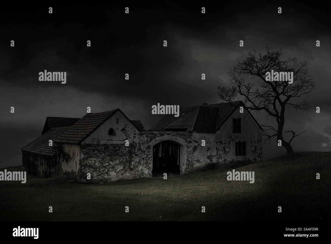 Spooky scene of haunted house and dark sky. Old house at night Stock ...