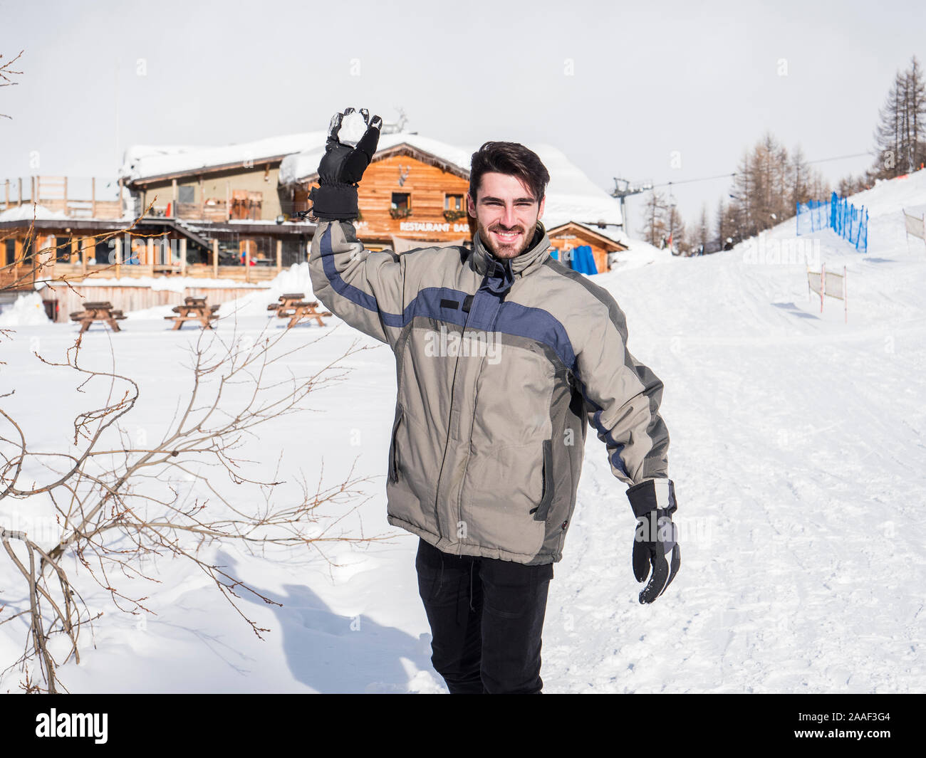 Man throwing snowball hi-res stock photography and images - Alamy