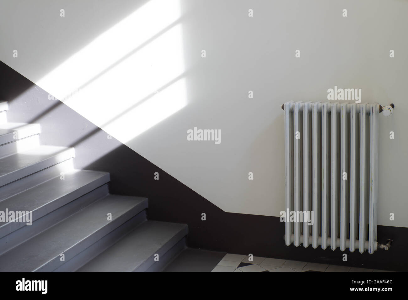 Interior of staircase in modern building. Heating system Stock Photo ...