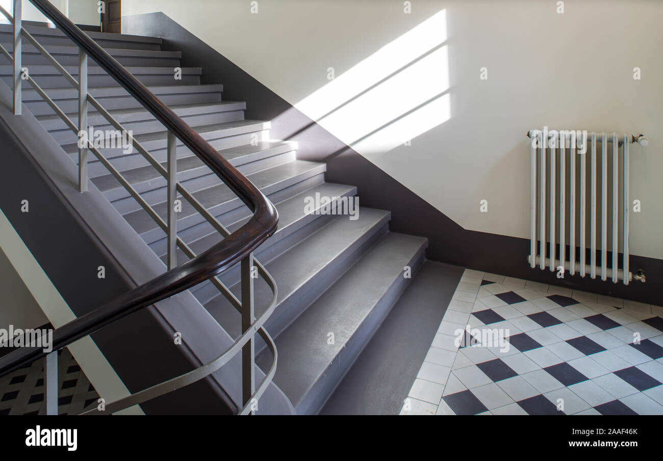 Interior of staircase in modern building. Heating system Stock Photo ...