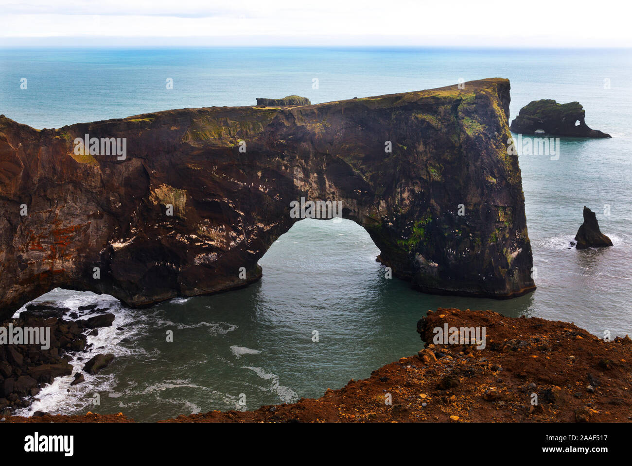 Dyrholaey arch on the coast of Reynisfjara near Vik, Iceland Stock ...