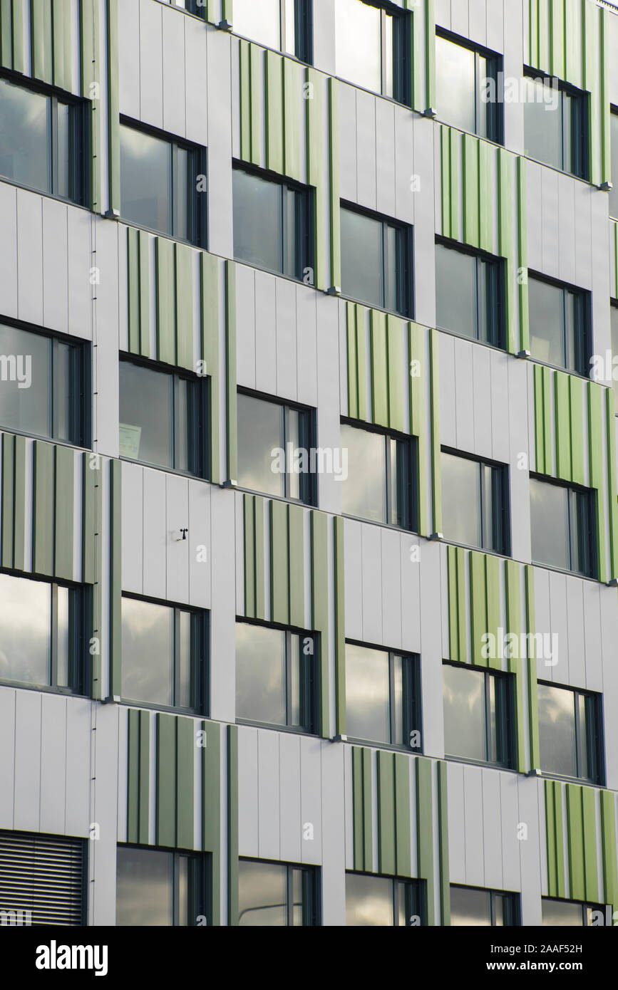 Wall of office building with windows. Modern exterior. Reflection in ...