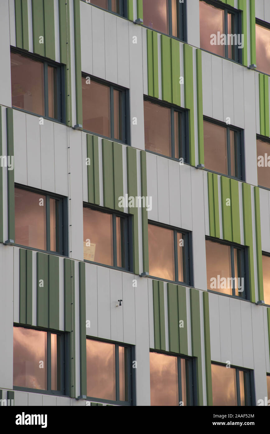 Wall of office building with windows. Modern exterior. Reflection in ...
