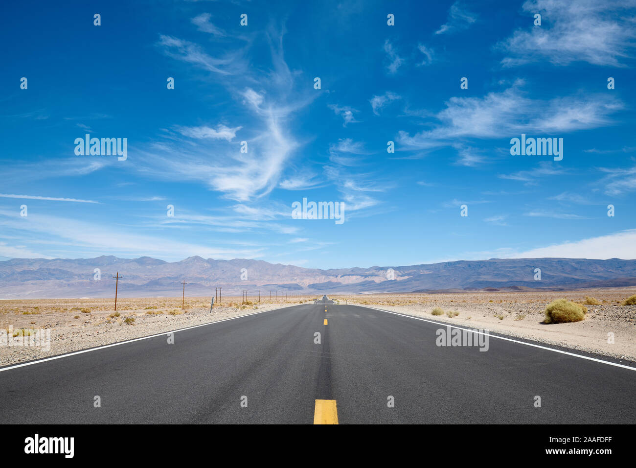 Scenic empty desert road in the Death Valley, USA Stock Photo - Alamy