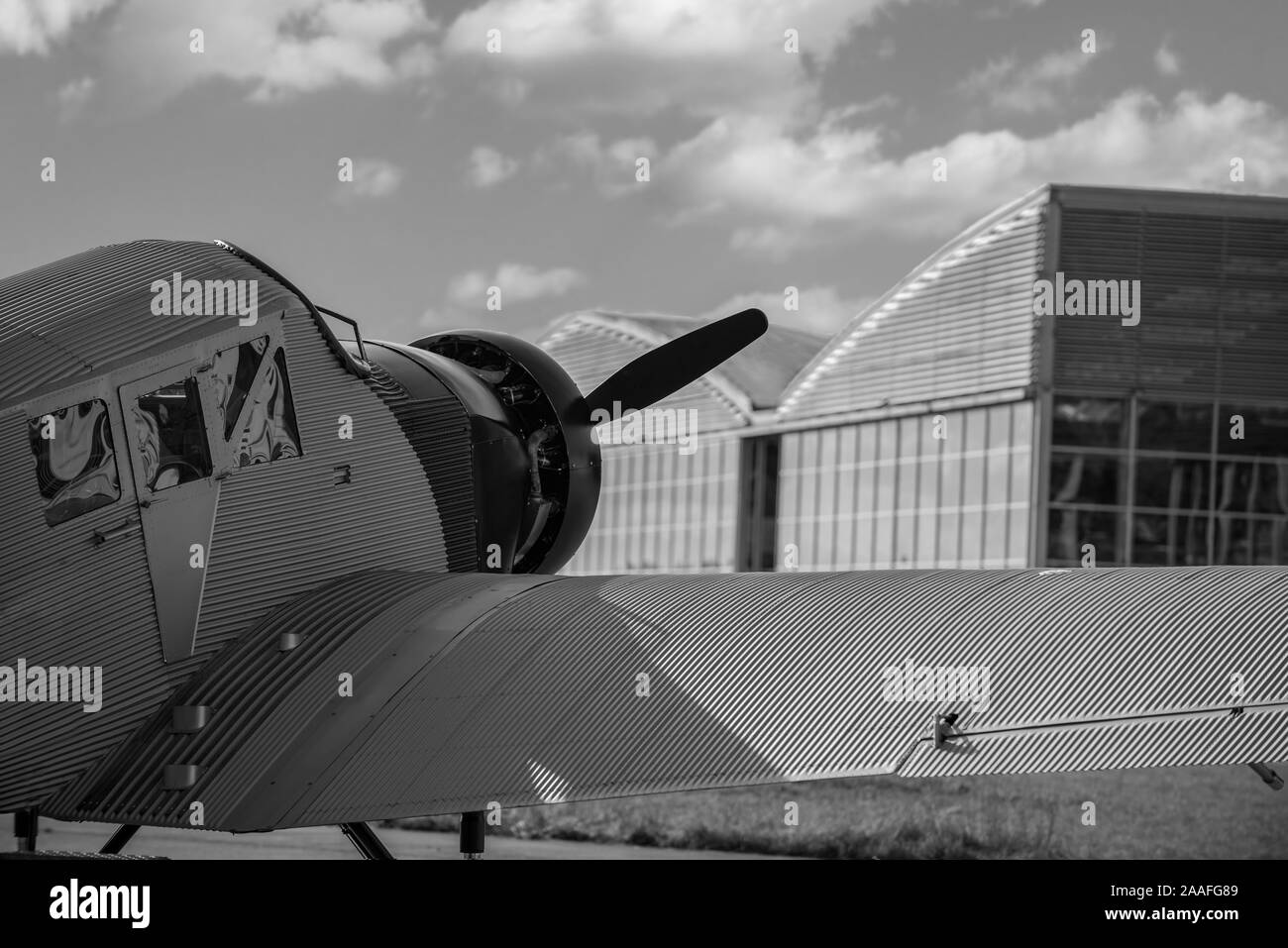 Old German airplane with propeller engine - Black and white Stock Photo ...