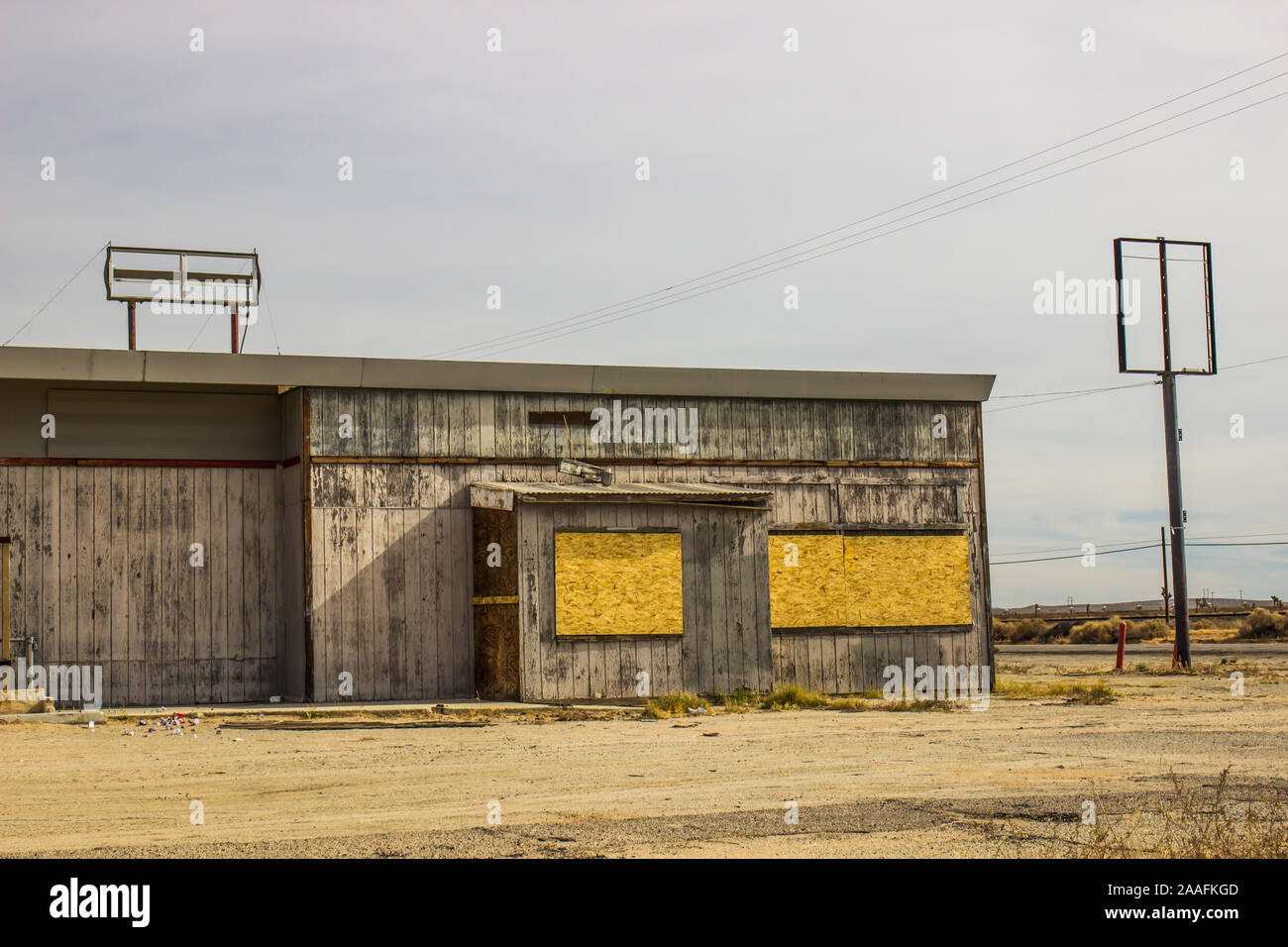 Abandoned Commercial Building With Boarded Up Windows Stock Photo - Alamy