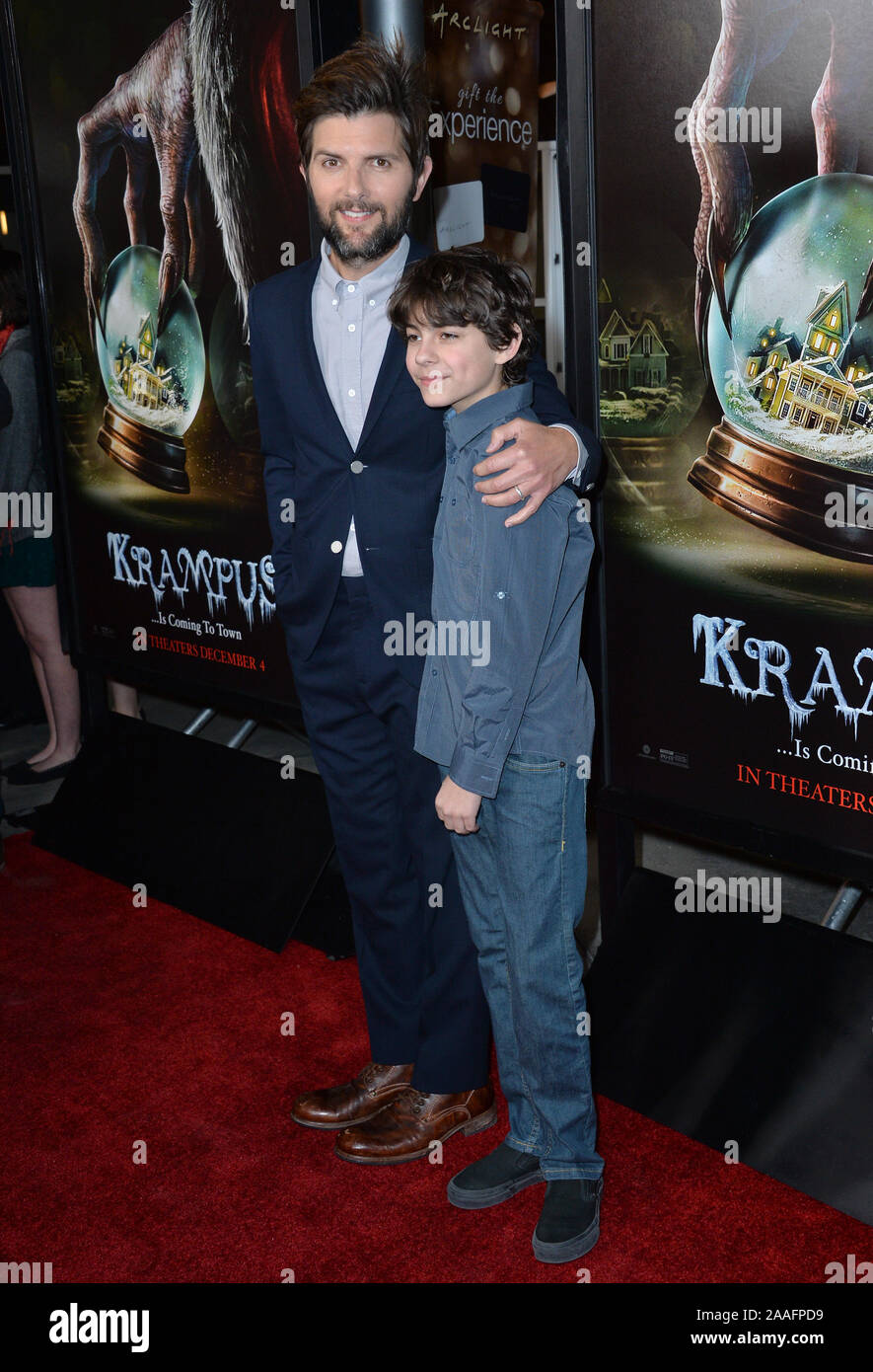 LOS ANGELES, CA - NOVEMBER 30, 2015: Actors Adam Scott & Emjay Anthony ...