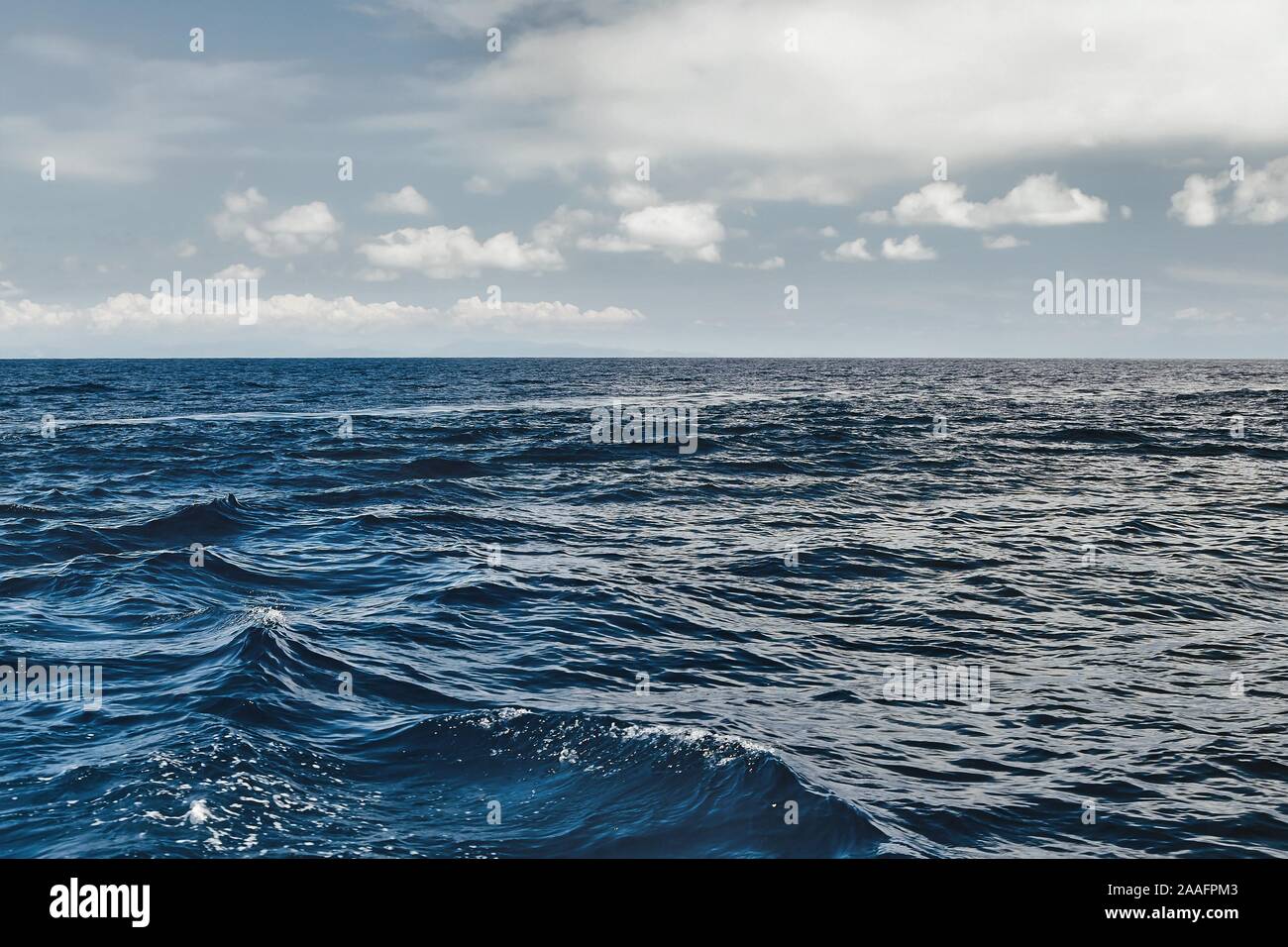 Endless sea view, blue water surface Stock Photo - Alamy