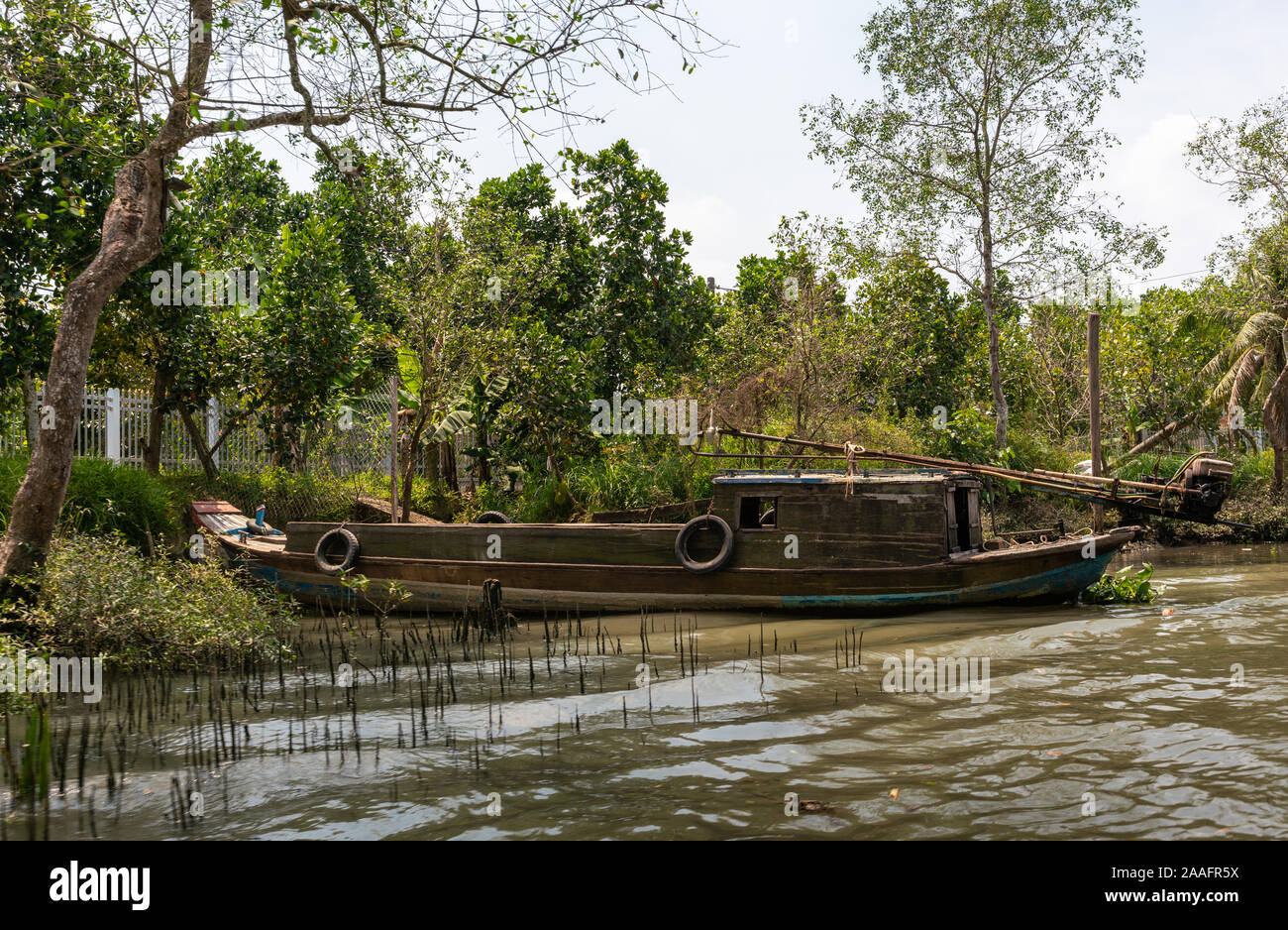 Tan Phong, Mekong Delta, Vietnam - March 13, 2019: Idle bown wooden ...