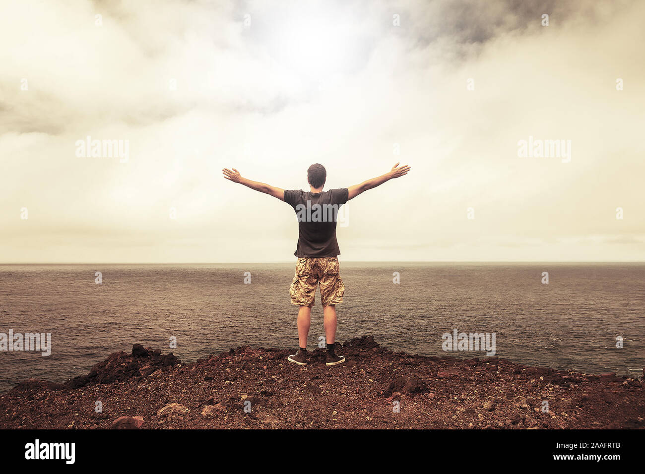 Success and freedom concept – grateful free person in front of bright ...