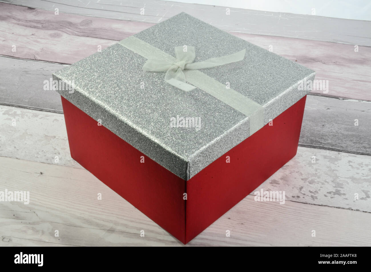 GOLD GIFT BOX WITH RIBON Stock Photo - Alamy