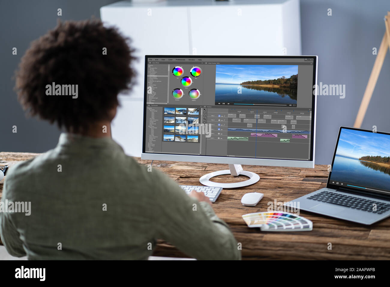 Video editing on laptop hi-res stock photography and images - Alamy
