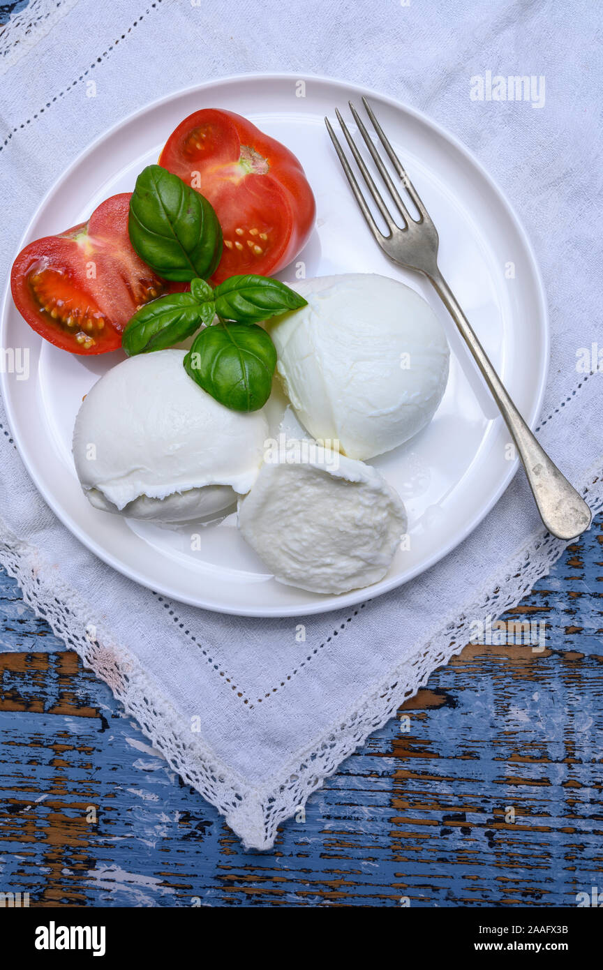Cheese collection, organic mozzarella soft cheese served with ripe ...
