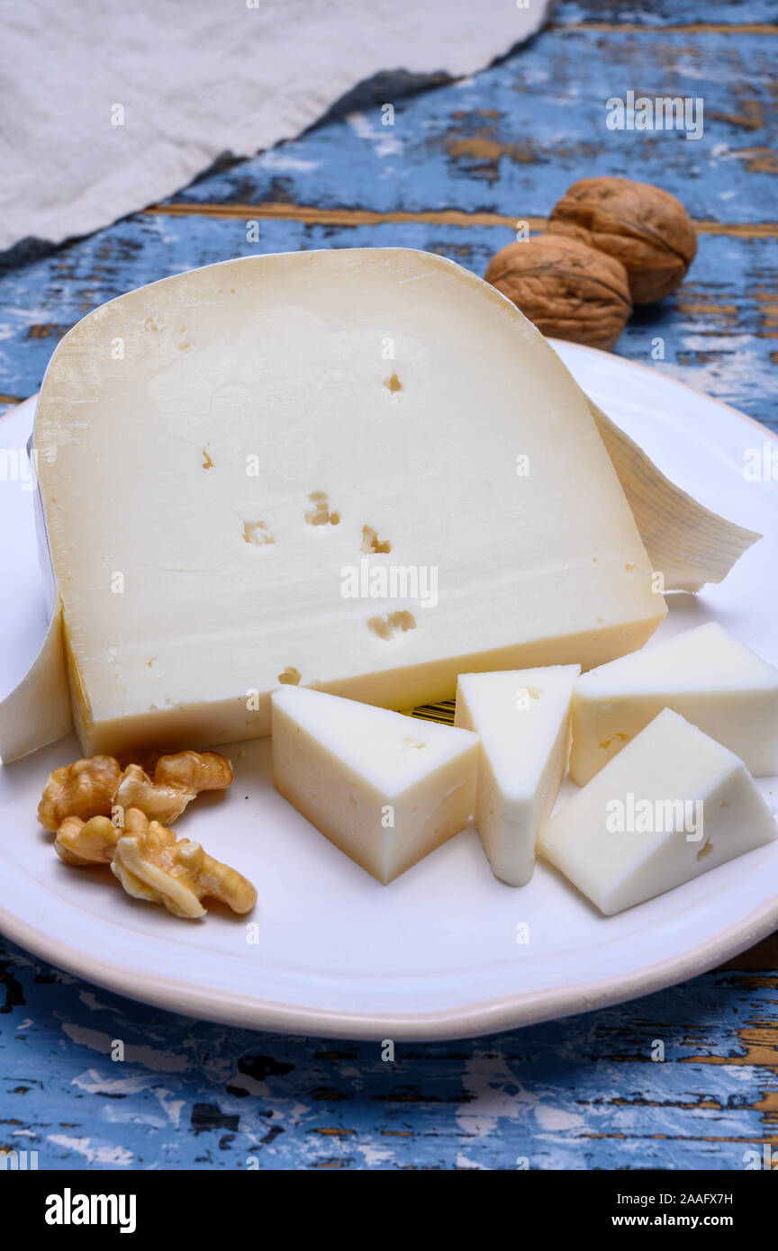 Cheese collection, Dutch hard white goat cheese close up Stock Photo ...