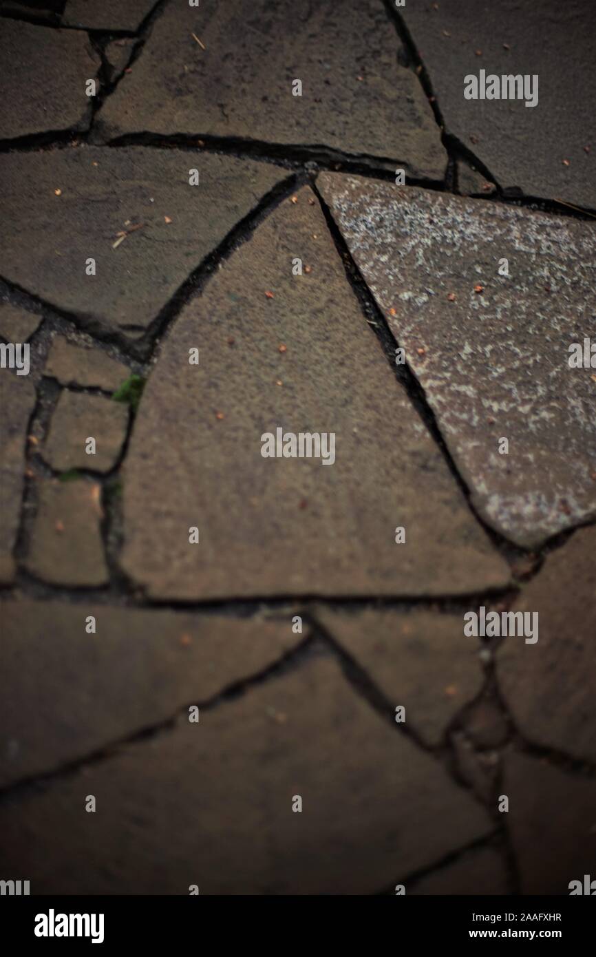 Wild stone floor closeup. Irregular shapes pattern Stock Photo - Alamy