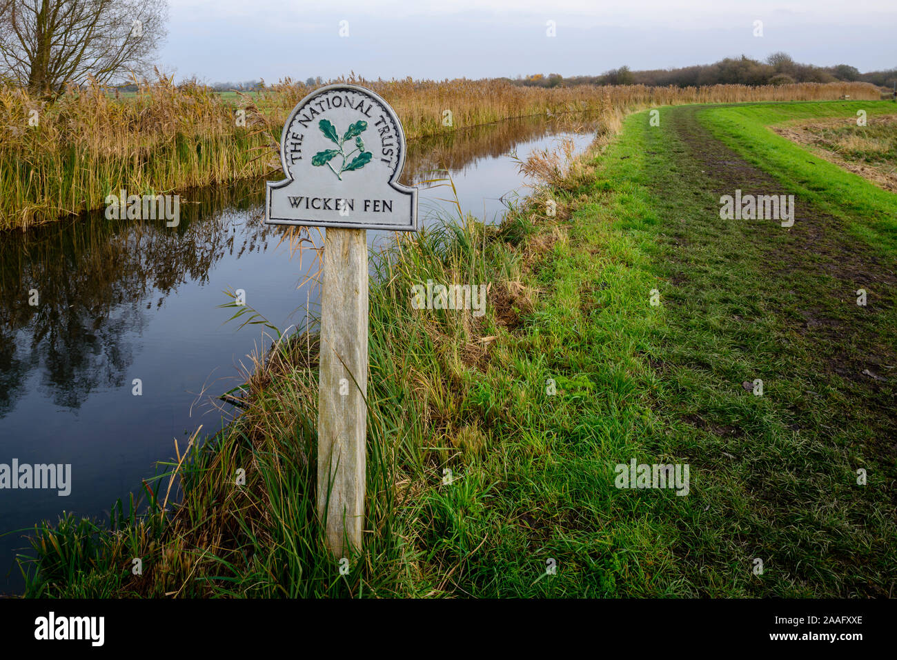 A sign post on the boundary of Wicken Fen which is owned and run by the ...