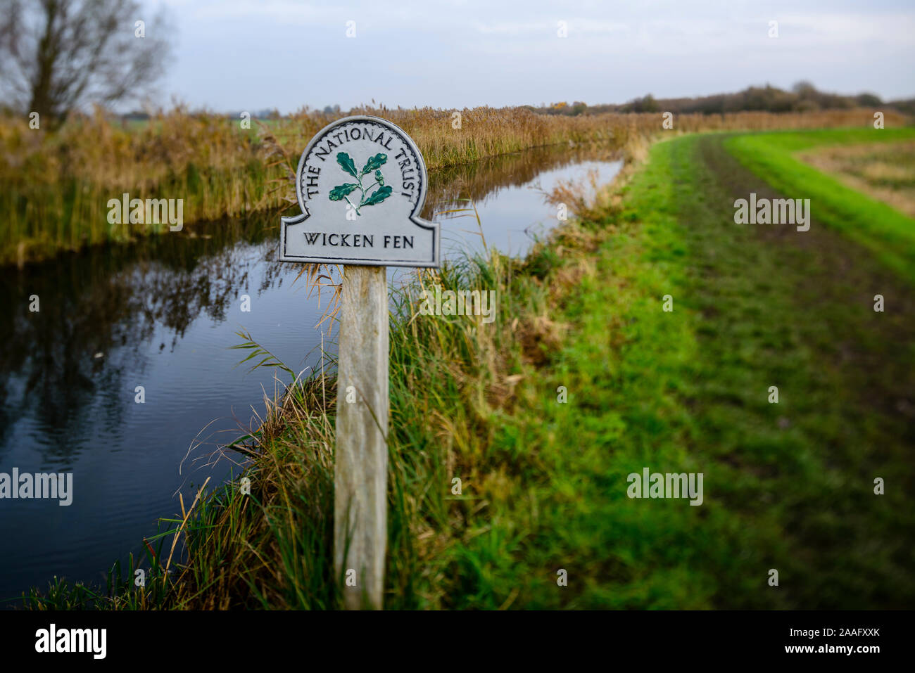 A sign post on the boundary of Wicken Fen which is owned and run by the ...