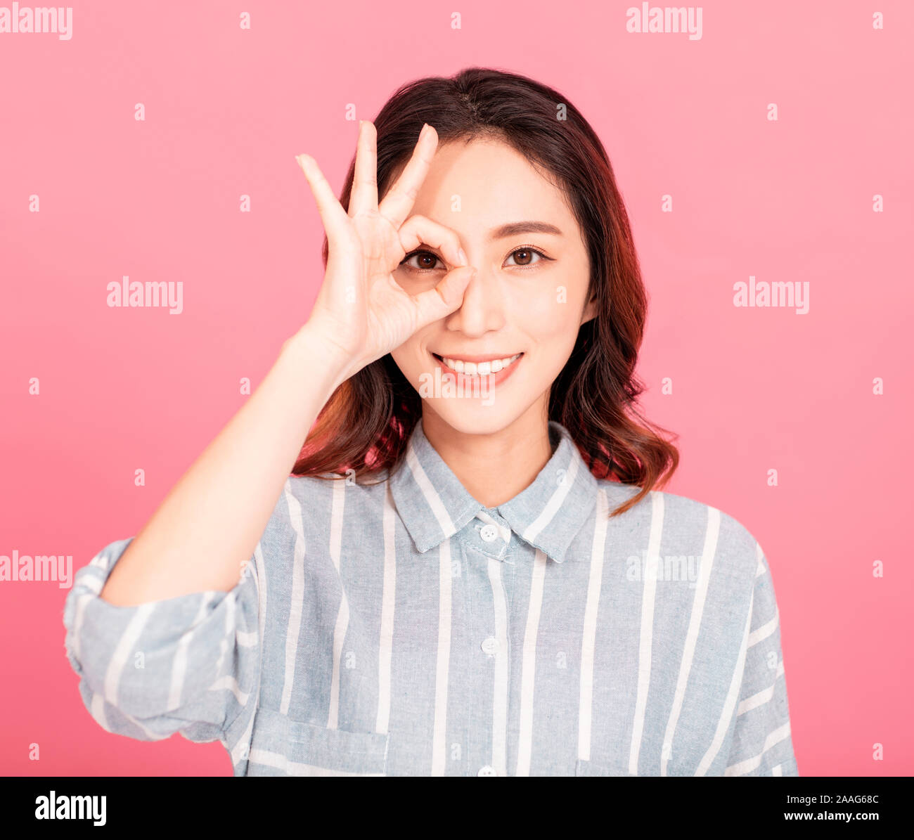 Asian woman covering face with hands hi-res stock photography and ...